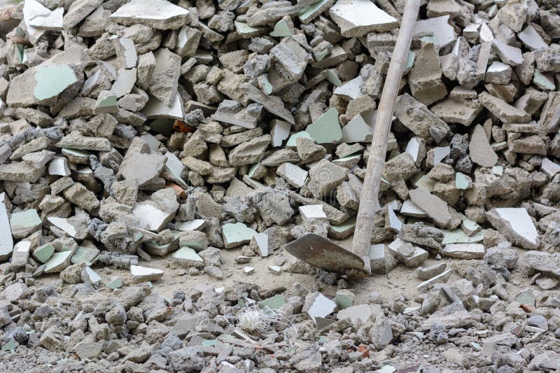 Hoe on Concrete Rubble Pile Stock Image - Image of preparing, material ...