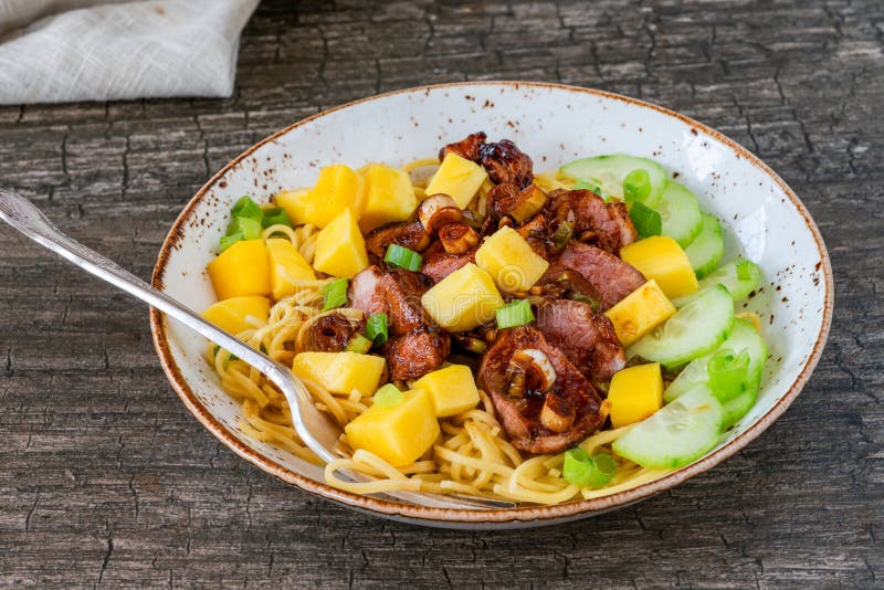 Hoisin duck with mango stock image. Image of cooking - 287684625