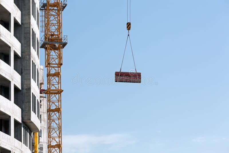 Hoisting Construction Works Stock Photo - Image of machinery, outdoors ...