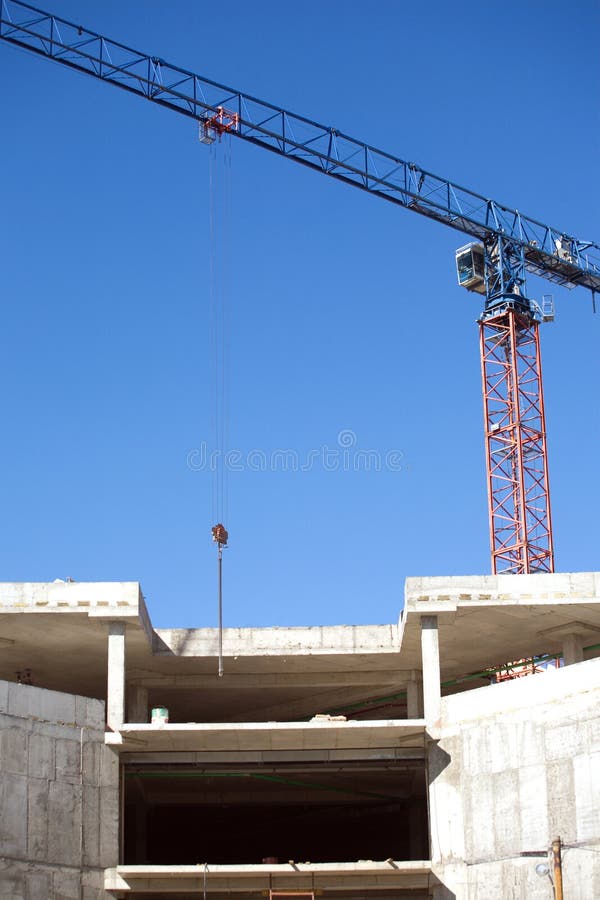 Hoisting Tower Crane and Top of Construction Building Stock Photo ...