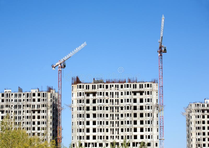 Hoisting Tower Cranes and Top of Construction Buildings Stock Image ...