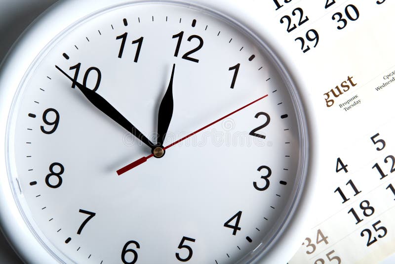 Hoja De Un Calendario Con Esfera De Reloj Imagen de archivo - Imagen de ...