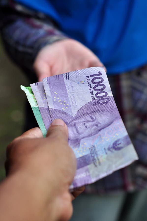 Hold Indonesia Rupiah Banknote Money for Trade Transaction Stock Image ...
