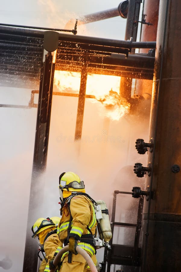 Firefighters Extinguishing Pipeline Fire Stock Photo - Image of ...