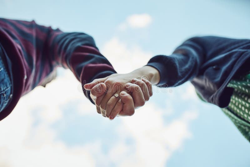 Hold Tight and Never Let Go. Low Angle Shot of an Affectionate Couple ...