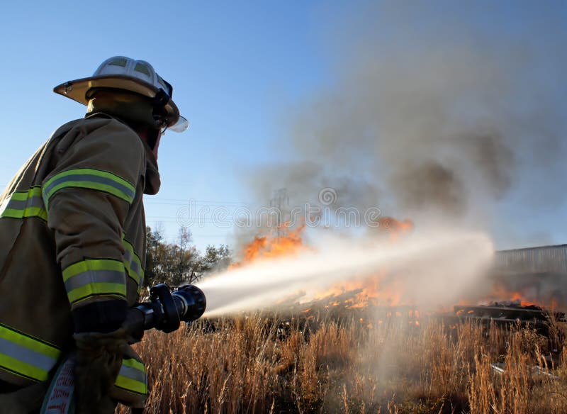 Firefighters stock image. Image of inferno, uniforms, rescuers - 2348909