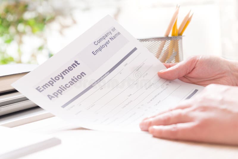 Holding Blank Employment Application Form Stock Photo - Image of ...