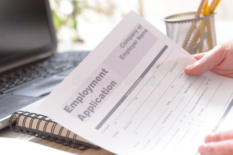Holding Blank Employment Application Form Stock Photo - Image of ...