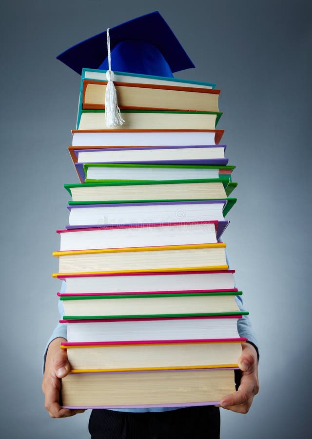 Holding books stock image. Image of cover, educational - 16558353