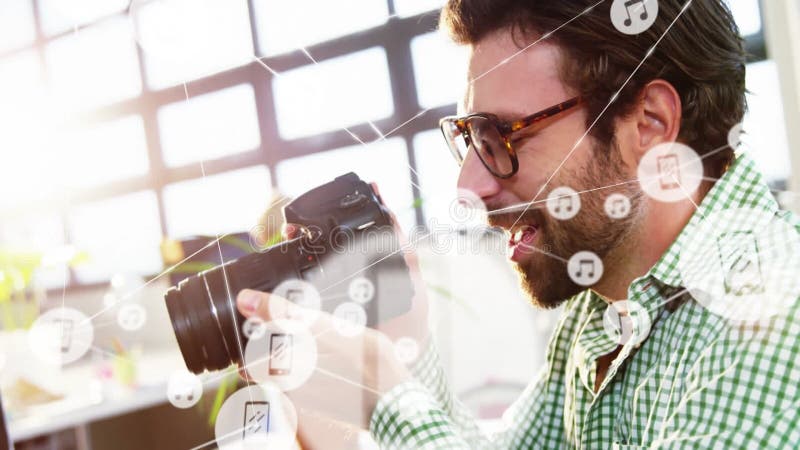 Holding Camera, Man Surrounded by Music Notes and Network Animation ...