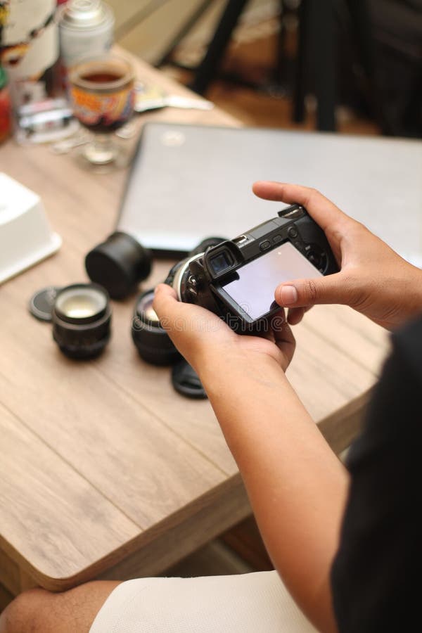 Holding the Camera, Version 8 Stock Image - Image of modern, classic ...