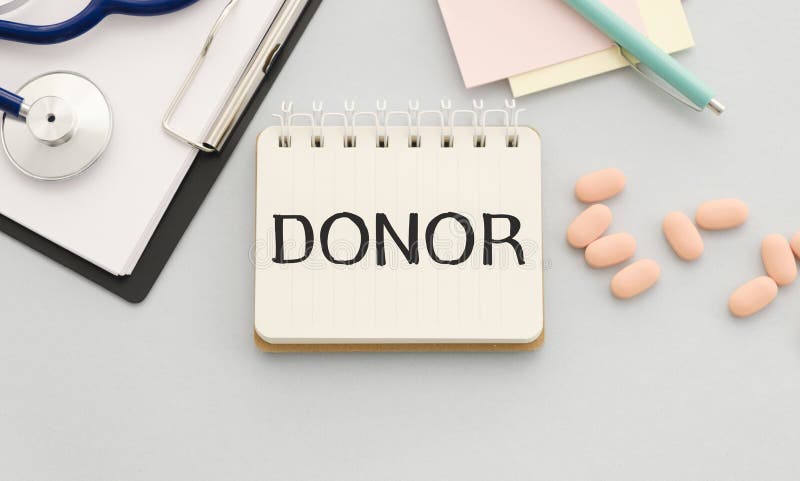 Word Donor Made of Colorful Wooden Cubes on Light Blue Background Stock ...