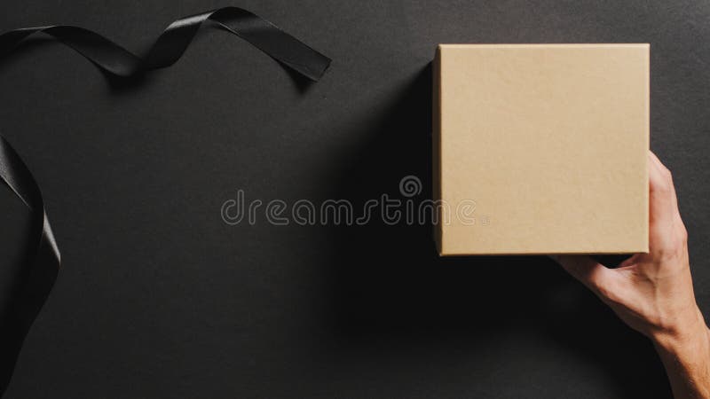Holding cardboard box stock photo. Image of shopping - 261364770