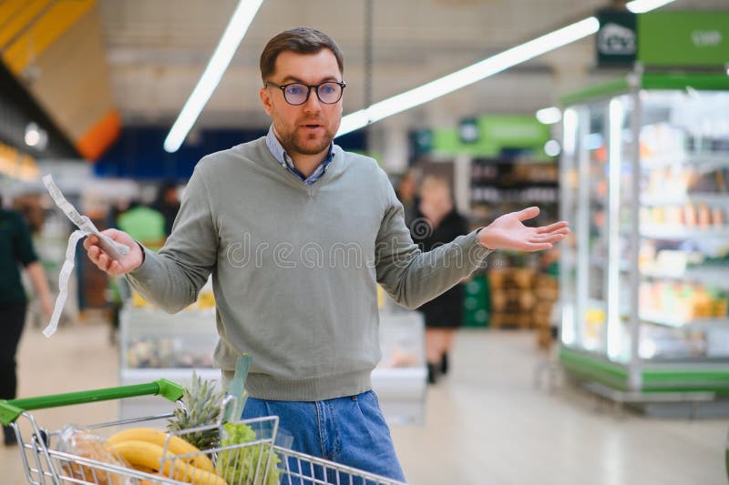 Holding Check. Disappointed with Prices Stock Image - Image of short ...