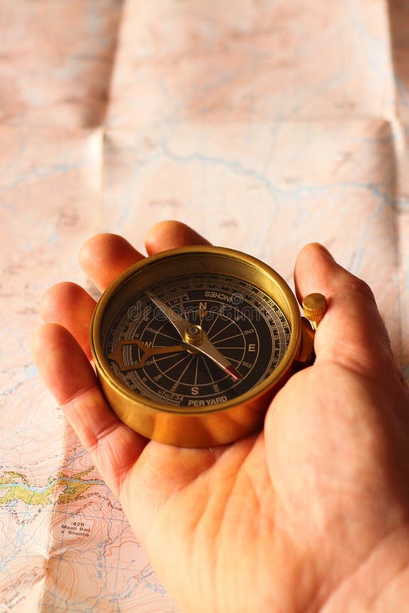 Holding compass B stock photo. Image of degrees, direction - 23310712