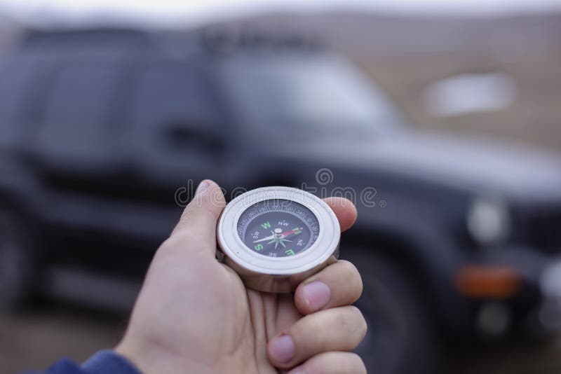 Holding a Compass in Front of a Car Stock Photo - Image of destination ...