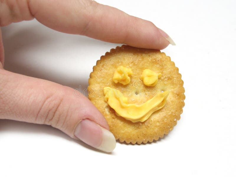 Holding a Cracker with a Smile Stock Image - Image of white, nutritious ...