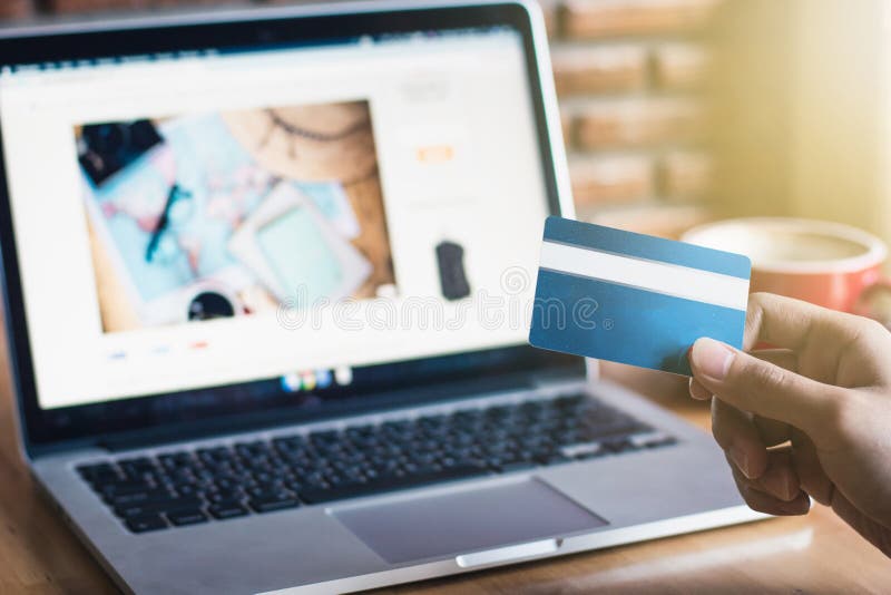 Holding Credit Card in Front of Laptop Stock Photo - Image of laptop ...