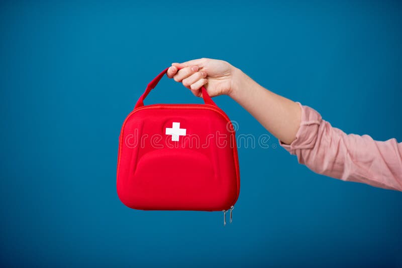 First Aid Kit on the Blue Background Stock Photo - Image of assistance ...