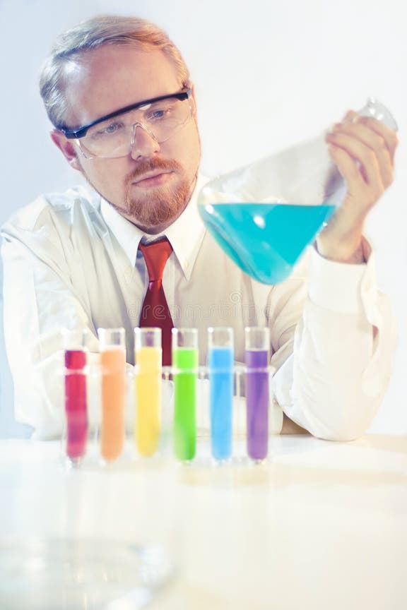 Holding Flask stock image. Image of liquid, scientist - 33047287