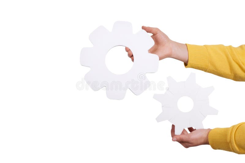 Holding Gears: Hands Connecting White Paper Gears on White Stock ...