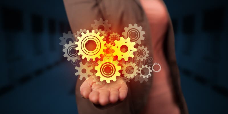 Holding gears in his hand stock photo. Image of move - 152004574