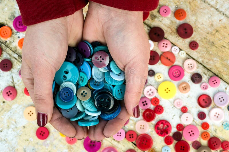 Holding Handful of Colourful Sewing Buttons Stock Photo - Image of ...