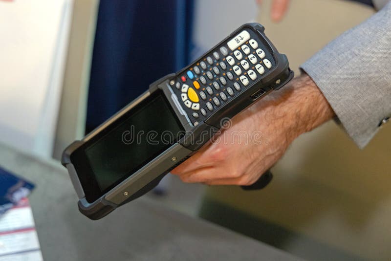 Holding Handheld Computer Reader Stock Image - Image of balkans, keypad ...