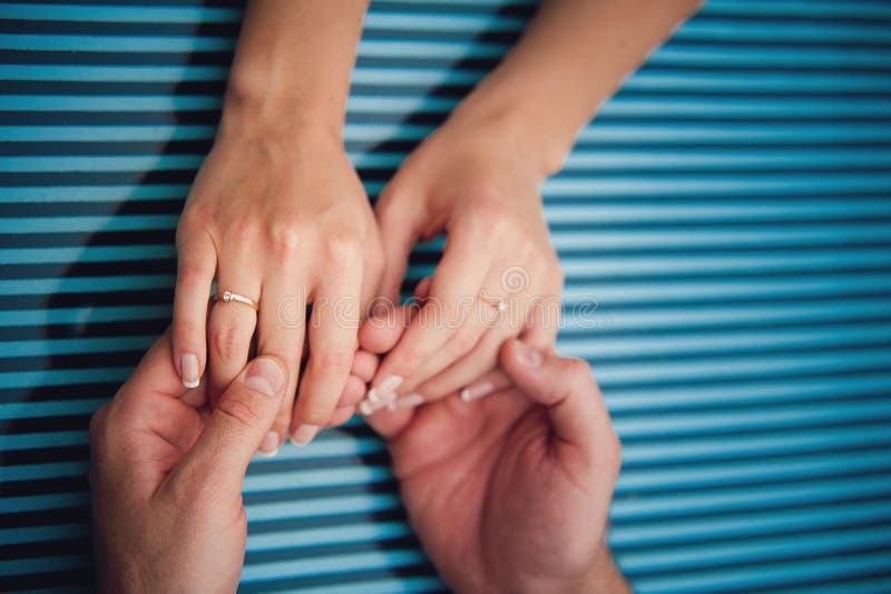 Holding Hands on Blue Background Stock Image - Image of wedding ...