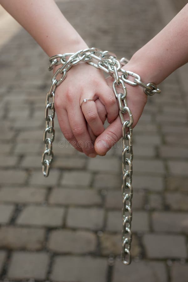 Holding hands with chain stock image. Image of love, bind - 42504445