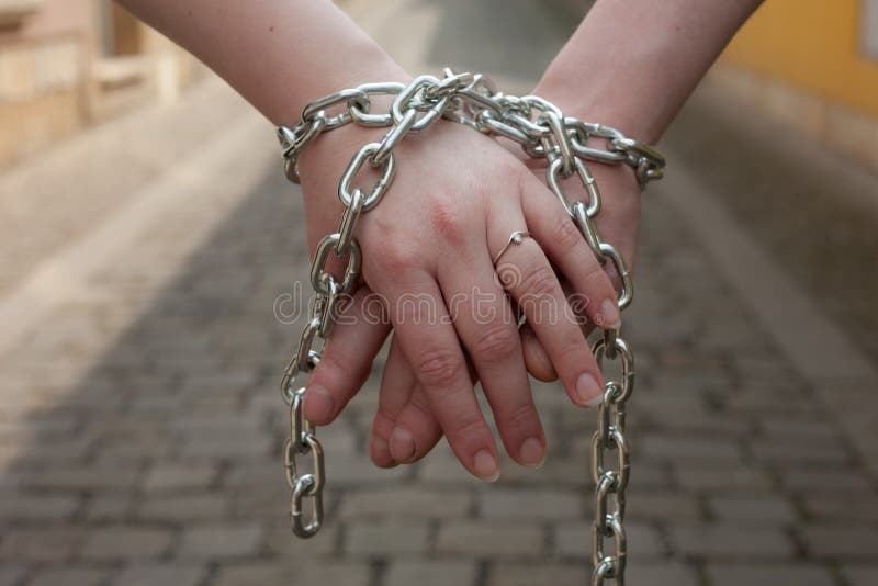 Holding hands with chain stock image. Image of together - 42504483