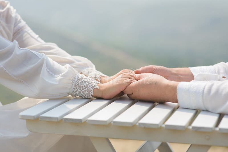 Holding Hands in Sunlight stock photo. Image of friendship - 81373016