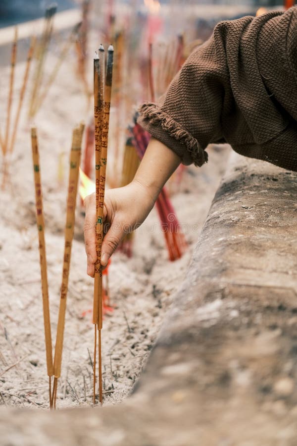 Holding incense in hand stock image. Image of spring - 237360637