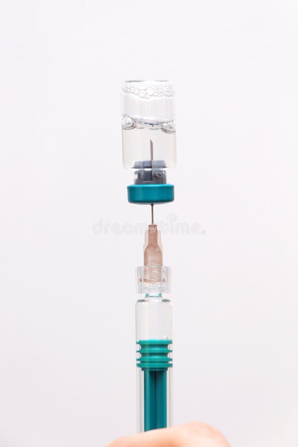 Holding injection vial stock photo. Image of bottle - 144234288