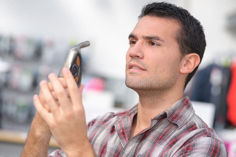 Holding and Inspecting Product Stock Photo - Image of price, commercial ...