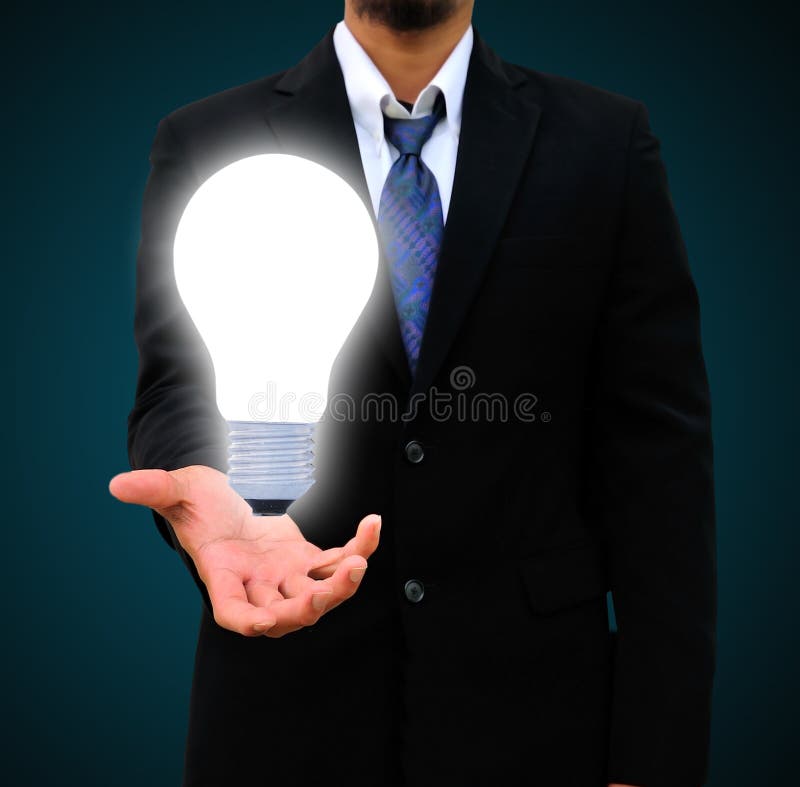 Holding light bulb stock photo. Image of creativity, professional ...