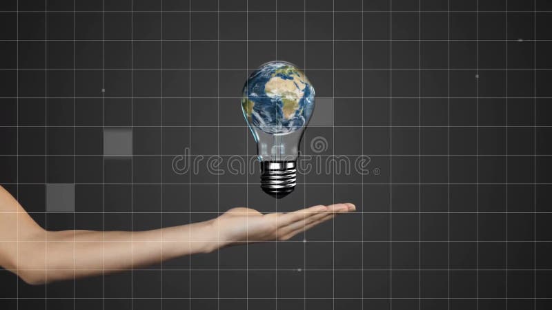Holding Light Bulb with Earth Inside, Hand Against Grid Background ...