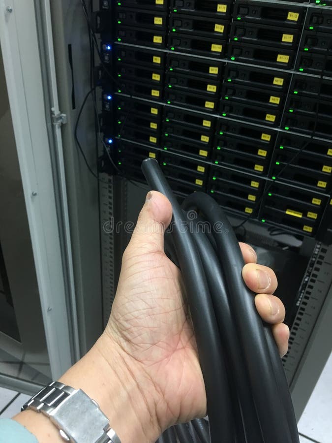 Holding a lot of cables. stock image. Image of gadget - 327264143