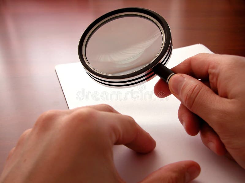 Holding a magnifying lens stock image. Image of magnify, holds - 2123