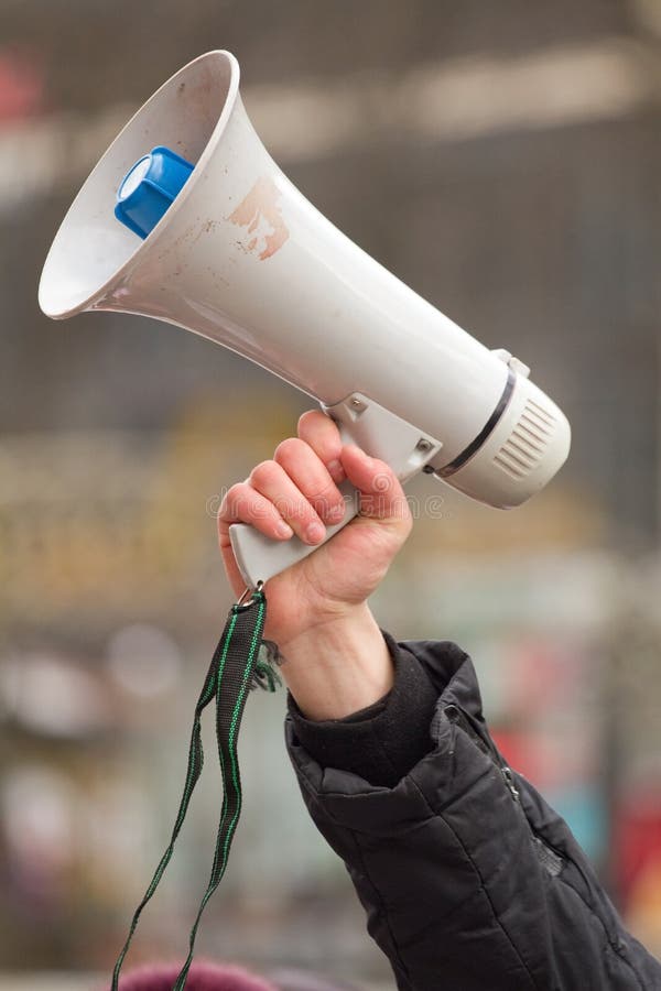 Holding a Megaphone stock photo. Image of bellowing, amplify - 23236360