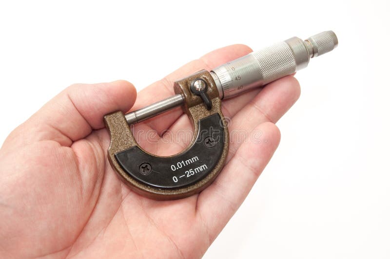 Micrometer in hand stock photo. Image of graduated, ideas - 165694486
