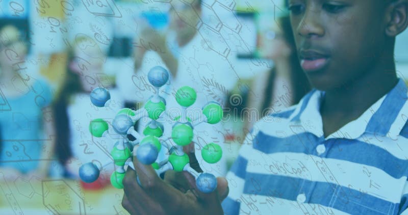 Holding Molecular Model, Child Studying Science Over Mathematical ...