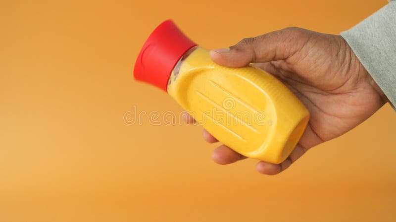 Holding a Mustard Mayonnaise Container Stock Footage - Video of closeup ...