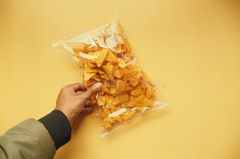 Holding a Open Chips Packet Top View Stock Image - Image of chips ...