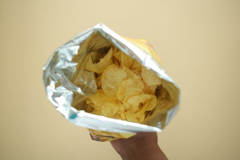 Holding a Open Potato Chips Packet Top View Stock Image - Image of ...