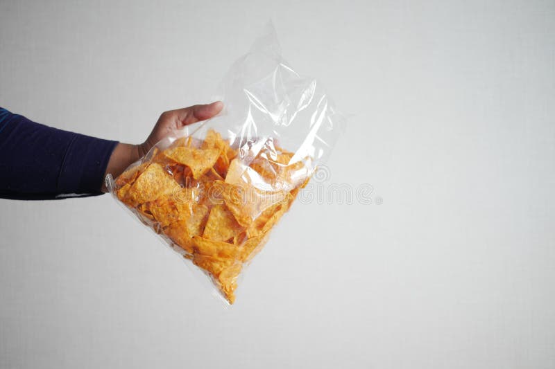 Holding a Open Potato Chips Packet Stock Image - Image of fried, chips ...