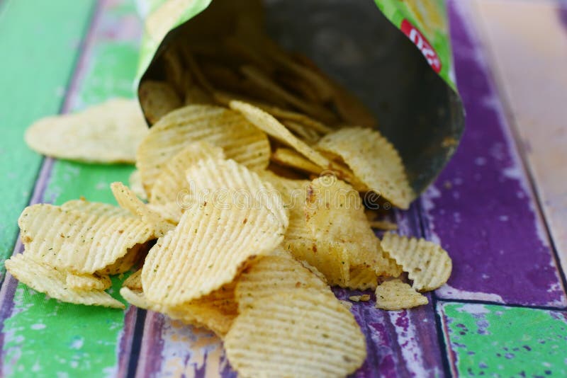 Holding a Open Potato Chips Packet Top View Stock Image - Image of ...