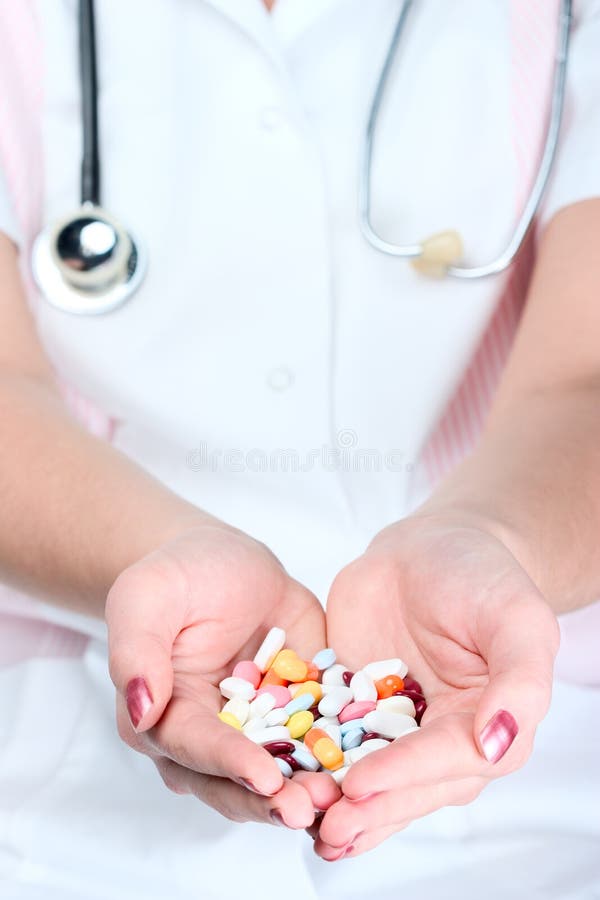 Holding out pills stock image. Image of healthcare, holding - 1717393