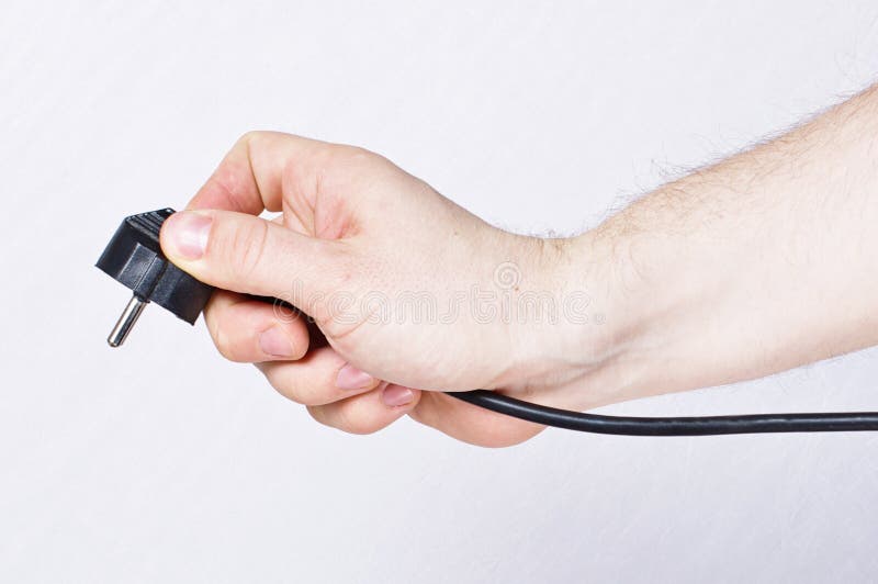 Holding power plug stock image. Image of line, global - 37505069