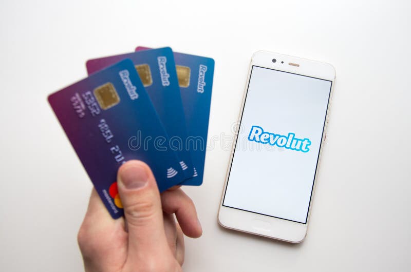 Holding Revolut Mobile Bank Card with Turned on App on Phone Editorial ...